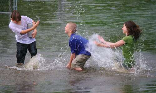 Wet fun in a flood – Times News Online