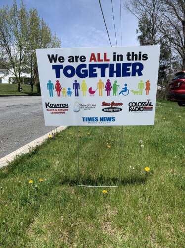 Community signs promote a message of unity – Times News Online