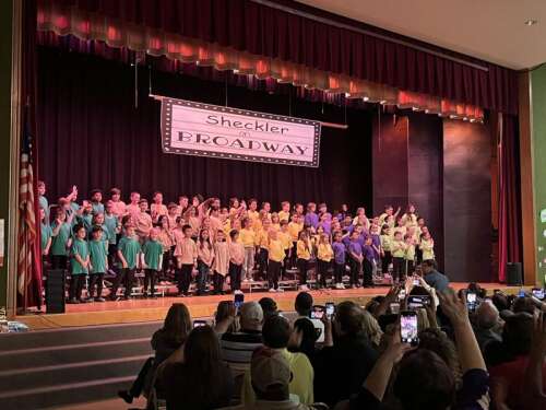 Sheckler on Broadway! Students sing at concert, show off artwork ...