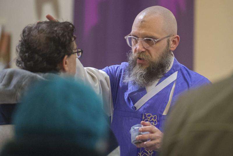 Churches adapt ash distribution for COVID-19 – Times News Online